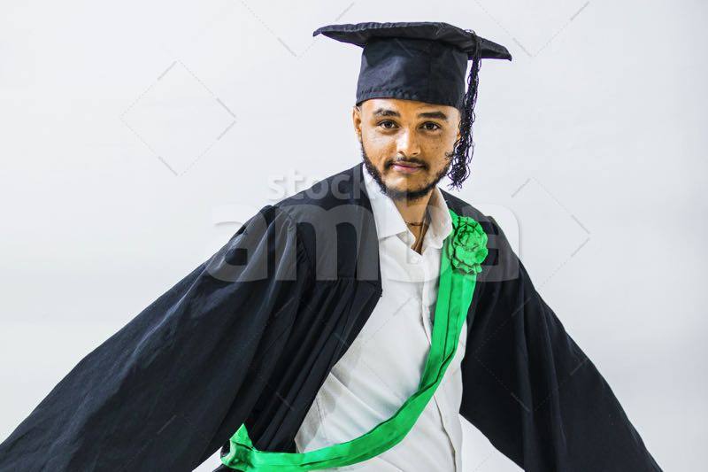 Male Graduate Student with Graduation Uniform - StockAMBA.com