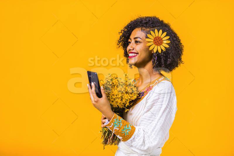 Smiling Girl In Habesha Dress Adey Abeba in Hair Looking Away In Hand ...