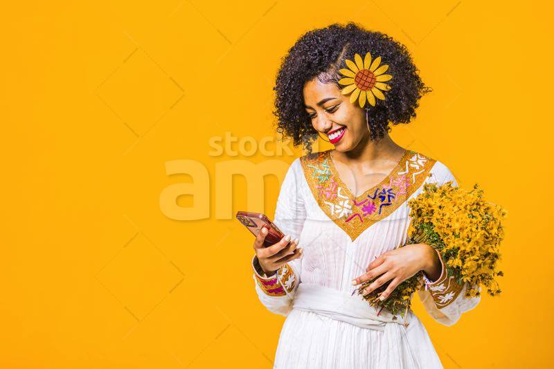 Smiling Girl In Habesha Dress Adey Abeba in Hair Taking a Selfie with ...